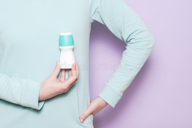Body Deodorant Roll-on in Woman S Hand Stock Photo - Image of liquid ...