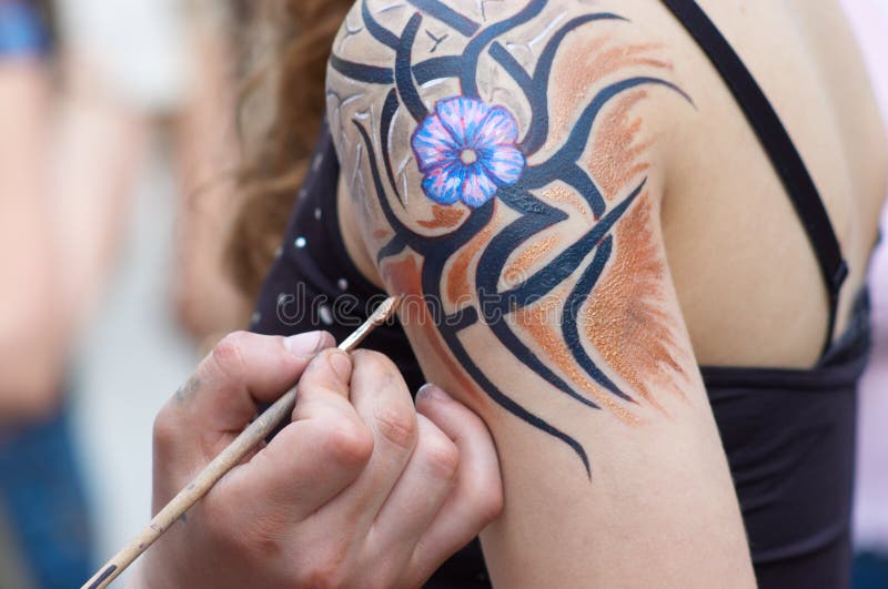 Body painting in process. stock image. Image of looking - 2550729