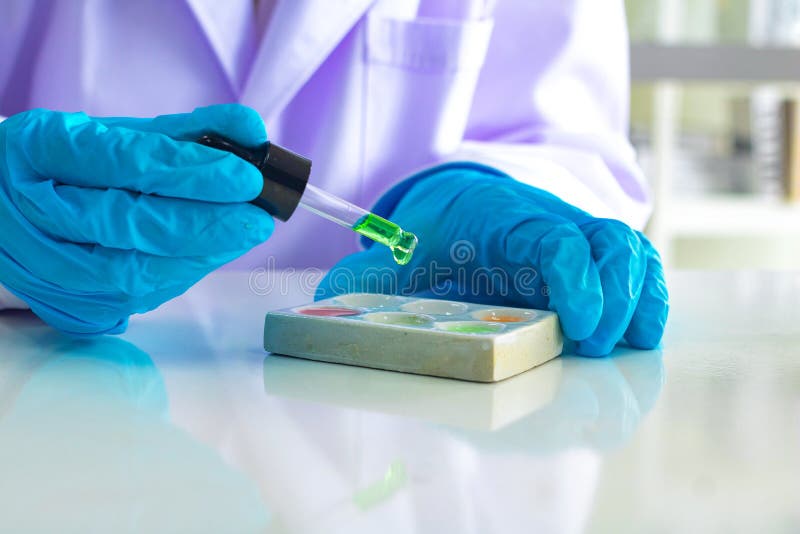 Body Past Scientist Working in Laboratory. she is Looking Microscope ...