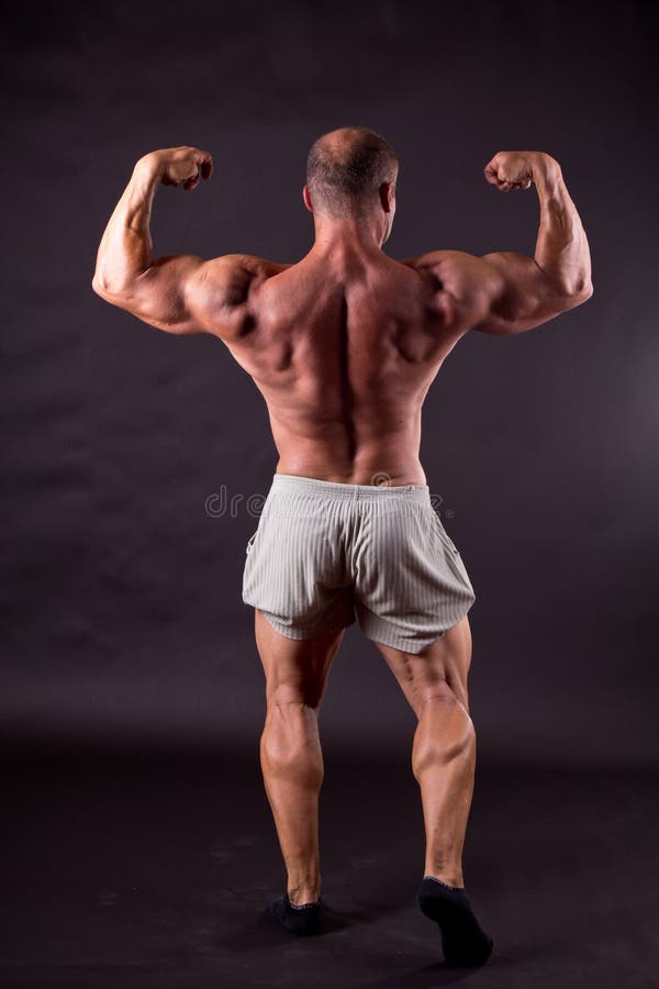 Bodybuilder stockfoto. Bild von muskel, aktiv, rückseite - 31688512