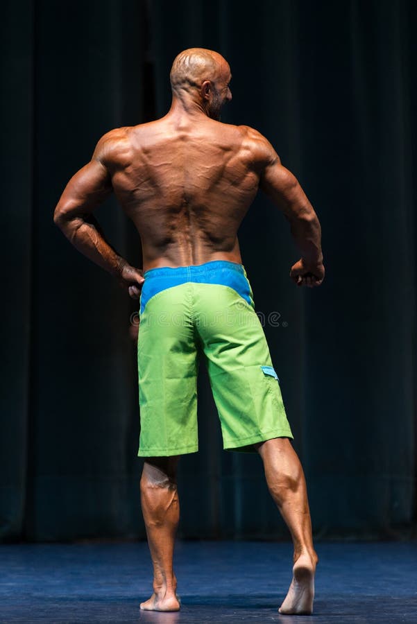 Two Men Bodybuilding Competition Stock Image - Image of exercises ...