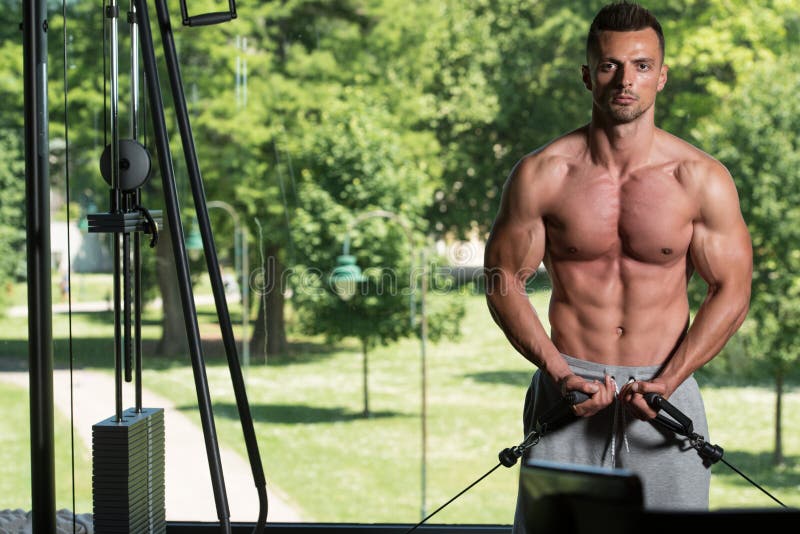 Bodybuilder Doing Exercise for Chest on Machine Stock Image - Image of ...