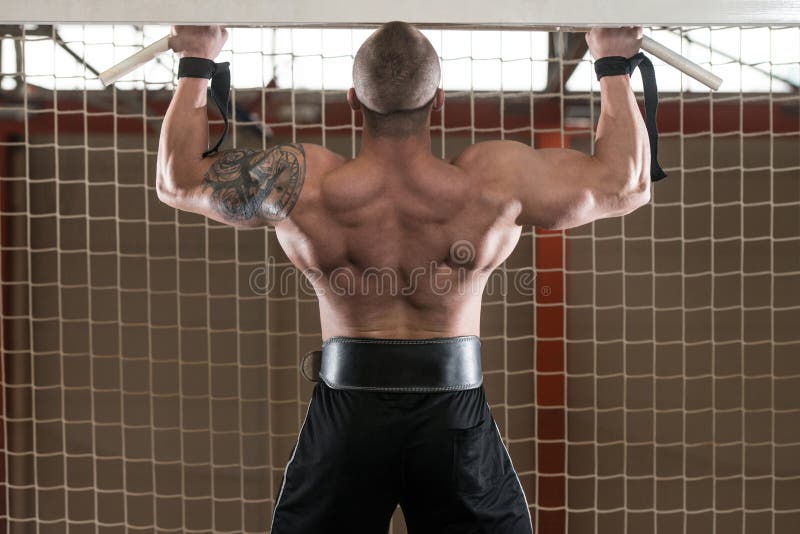 Bodybuilder Doing Pull Ups Best Back Exercises Stock Photo - Image of ...