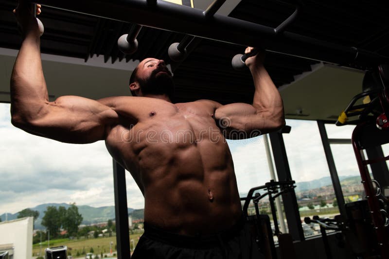 Male Athlete Doing Pull Ups Stock Image - Image of caucasian, muscle ...