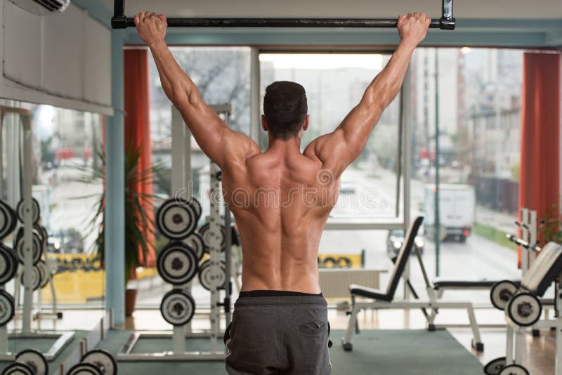 Bodybuilder Doing Pull Ups Best Back Exercises Stock Image - Image of ...