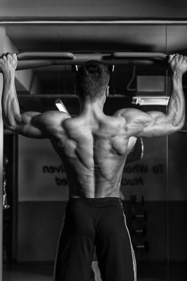 Bodybuilder Doing Pull Ups Best Back Exercises Stock Photo - Image of ...
