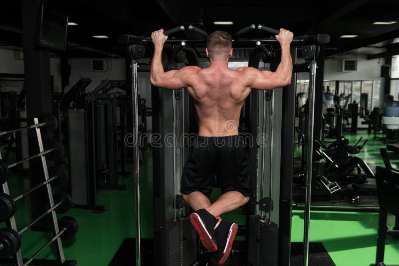 Bodybuilder Doing Pull Ups Best Back Exercises Stock Photo - Image of ...