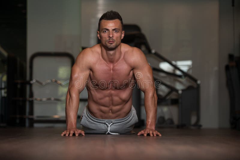 Bodybuilder Doing Push Ups on Floor Stock Image - Image of exercise ...