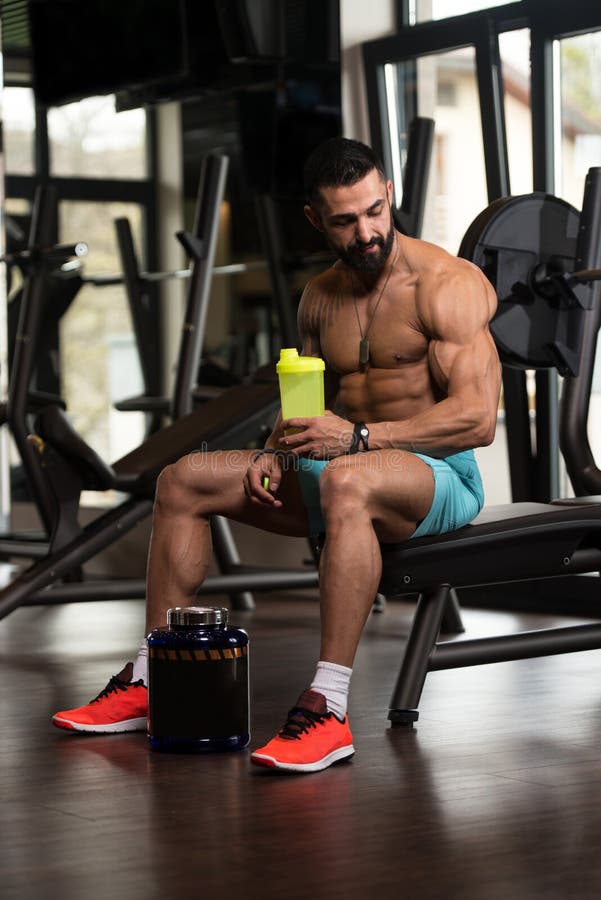 Bodybuilder Drinking Water from Shaker Stock Image - Image of body ...