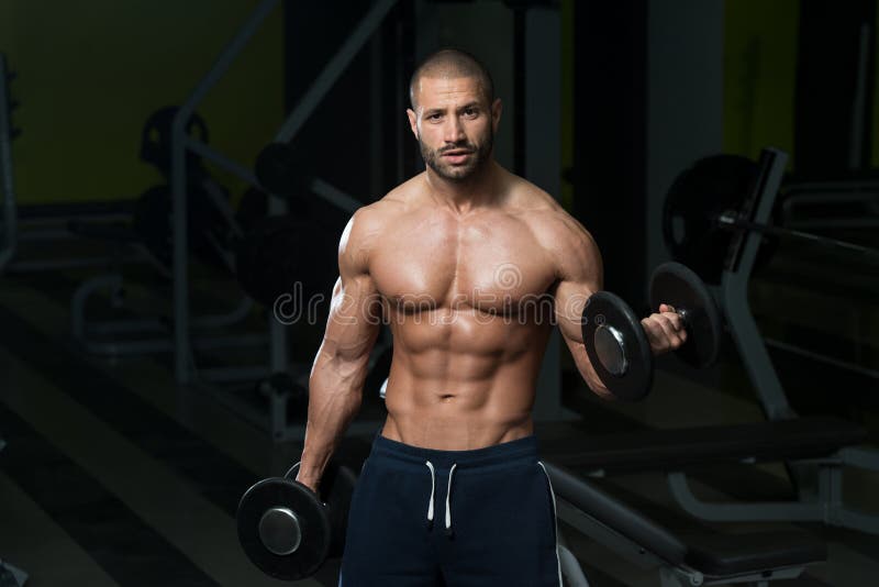 Bodybuilder Exercise with Dumbbells Stock Photo - Image of build ...