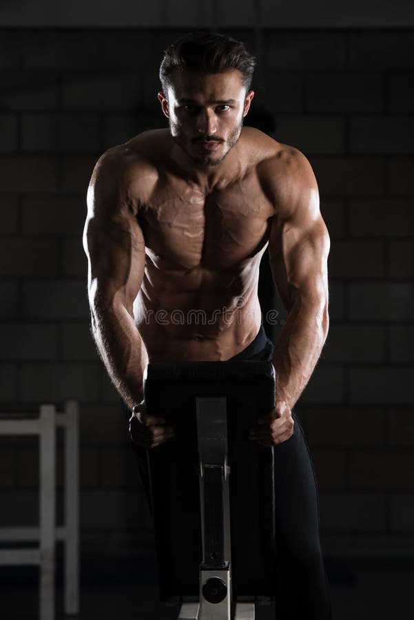 Bodybuilder Exercising Push Ups on Bench Stock Photo - Image of person ...