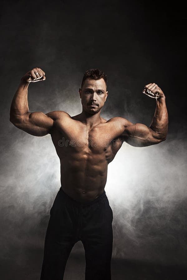Bodybuilder Flexing His Muscles Stock Photo - Image of lifestyles ...