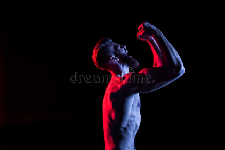 Bodybuilder Gesturing and Yelling Isolated on Black with Dramatic ...