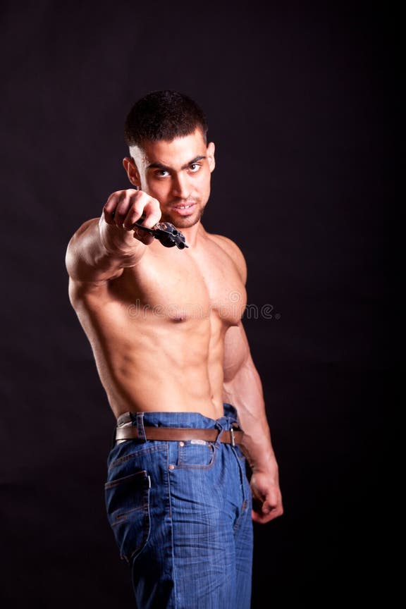 Bodybuilder with gun stock photo. Image of aggressive - 32442056