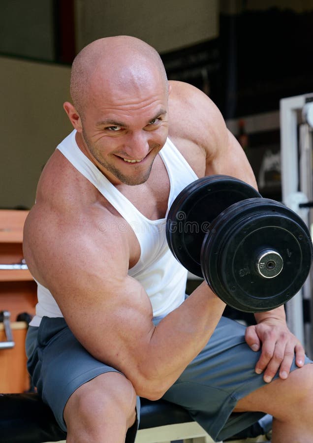 Bodybuilder in gym stock image. Image of action, body - 31326899