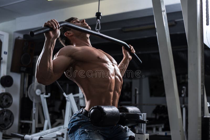Bodybuilder in the gym stock photo. Image of male, dumbbell - 63424266