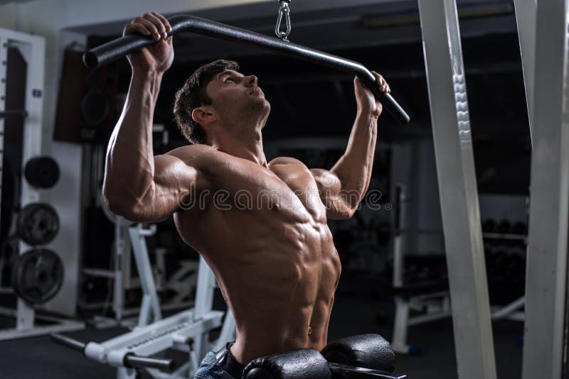 Bodybuilder in the gym stock photo. Image of male, dumbbell - 63424266