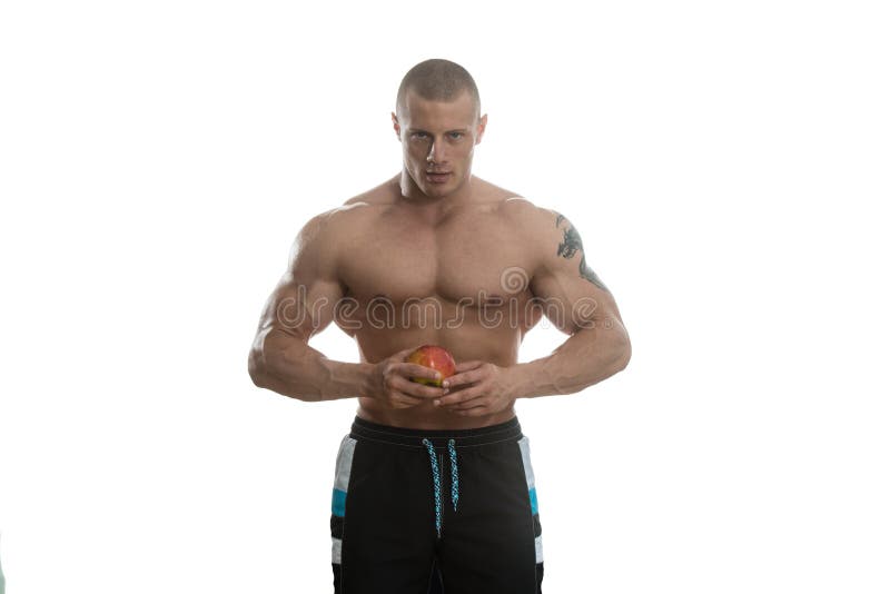 Bodybuilder Holding Apple Isolated on White Background Stock Image ...