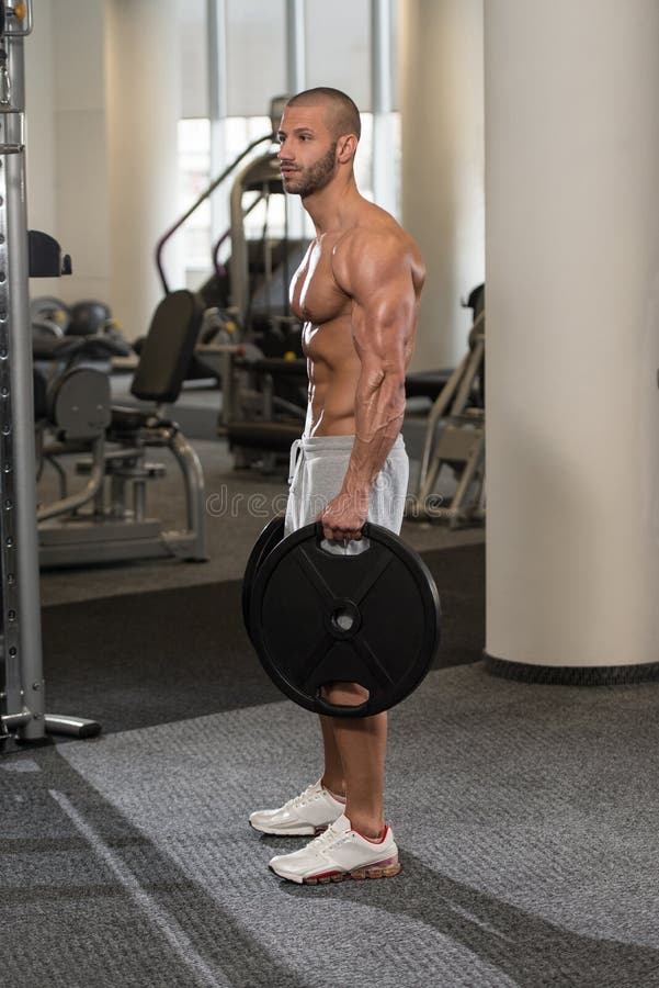 Bodybuilder Holding Weights in Hand Stock Image - Image of human ...
