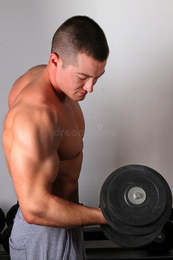 Bodybuilder Lifting Weights Stock Image - Image of strong, body: 38124881