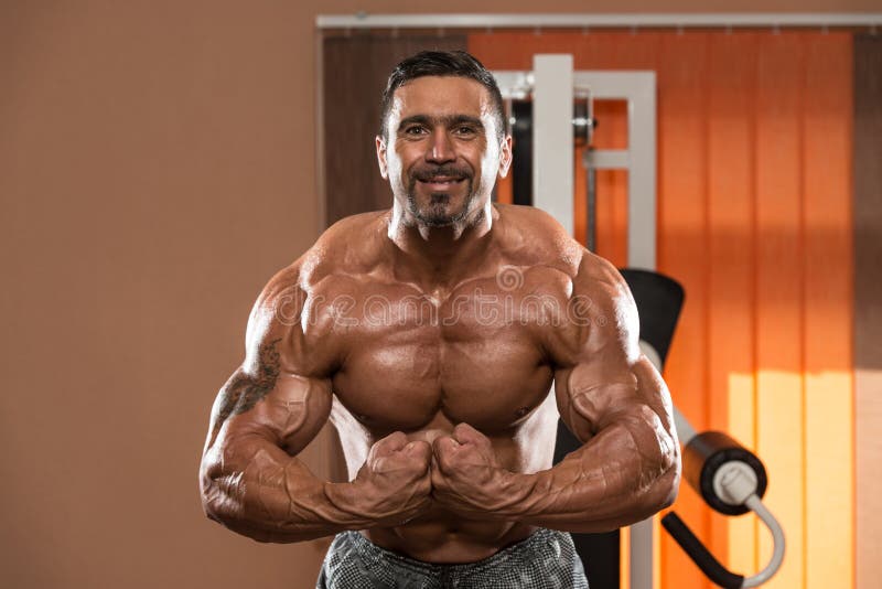 Bodybuilder Making Most Muscular Pose Stock Image - Image of aerobics ...