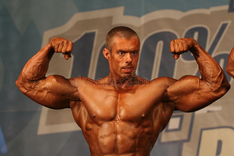 Bodybuilder posing editorial stock photo. Image of healthy - 6412293