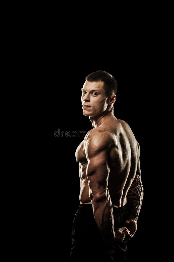 Bodybuilder Posing. Beautiful Sporty Guy Male Power. Fitness Muscular ...