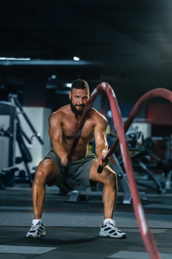 196 Muscular Young Man Pulling Rope Stock Photos - Free & Royalty-Free ...
