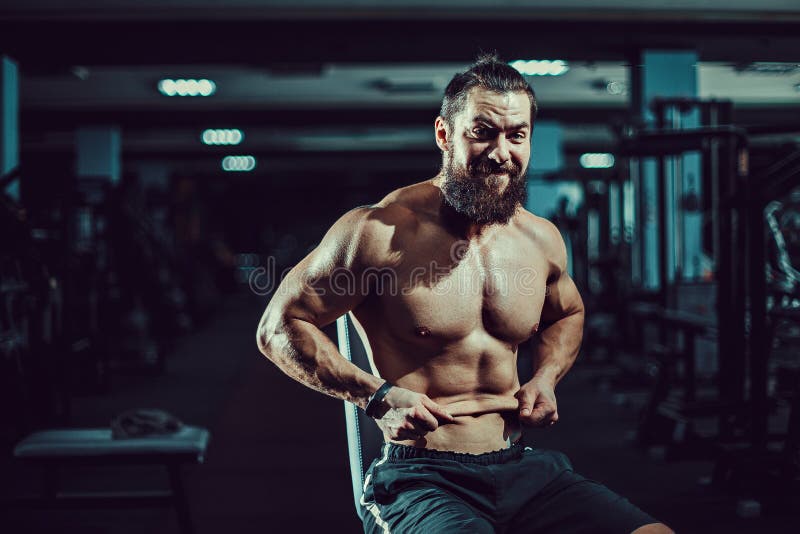Bodybuilder pulling skin stock photo. Image of active - 100836850