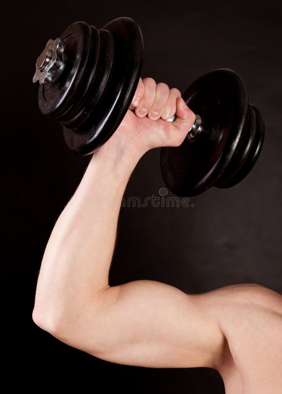 Bodybuilder Que Entrena a Su Bicep Imagen de archivo - Imagen de ...