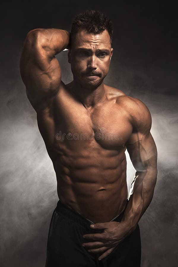 Bodybuilder showing abs stock photo. Image of lifestyles - 39660814
