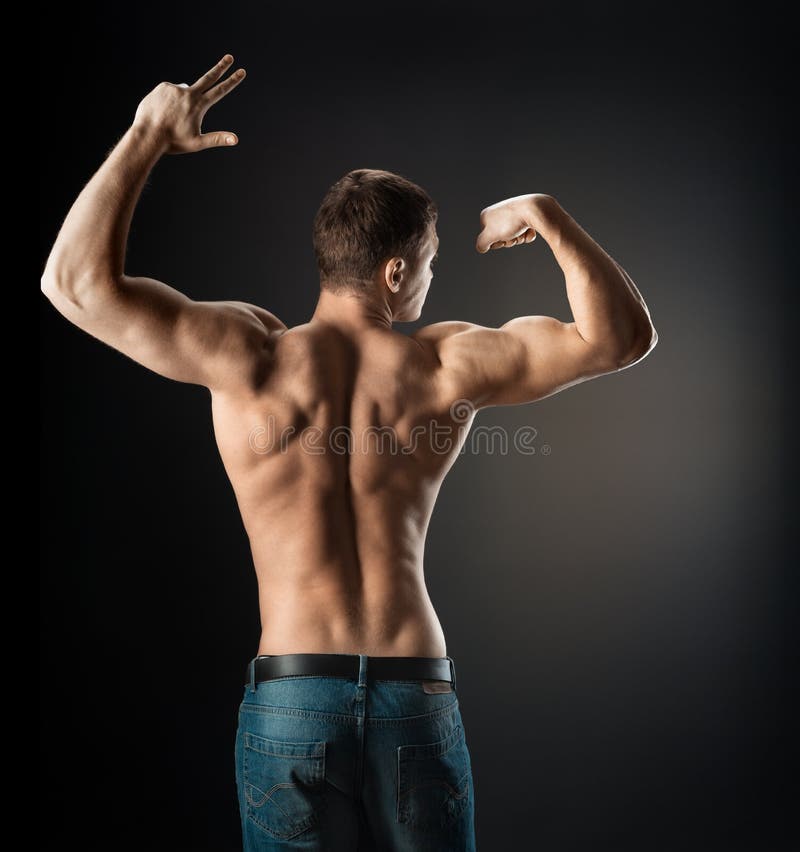 Bodybuilder Showing Muscles Back And Arms Stock Photo - Image of ...