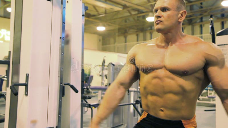 Bodybuilder Straining Muscles in Stock Footage - Video of champion ...