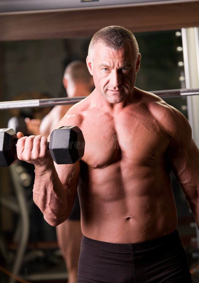 Bodybuilder training stock image. Image of lifting, athlete - 27755993