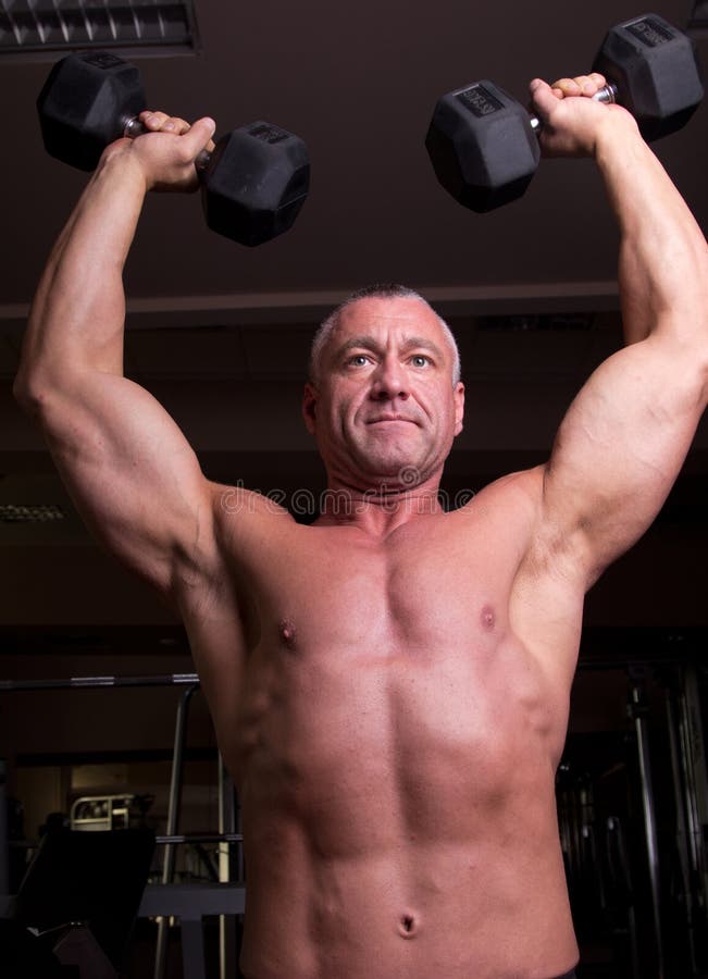 Bodybuilder training stock photo. Image of lifting, heavy - 27756010