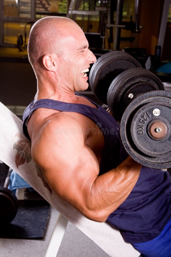 Bodybuilder training stock image. Image of skin, dumbbell - 9851233