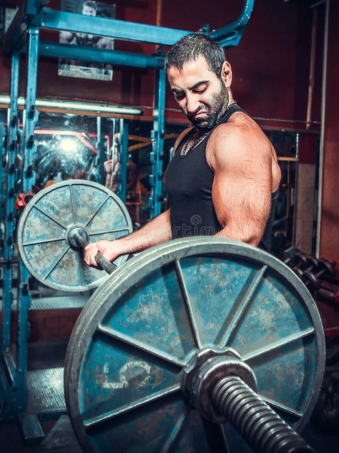 Bodybuilder Training His Muscles In Gym, Bodybuilder Training With ...