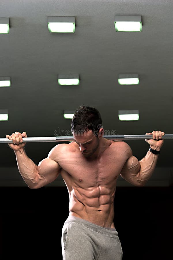 Bodybuilder Working Out with a Weight Bar Stock Image - Image of ...