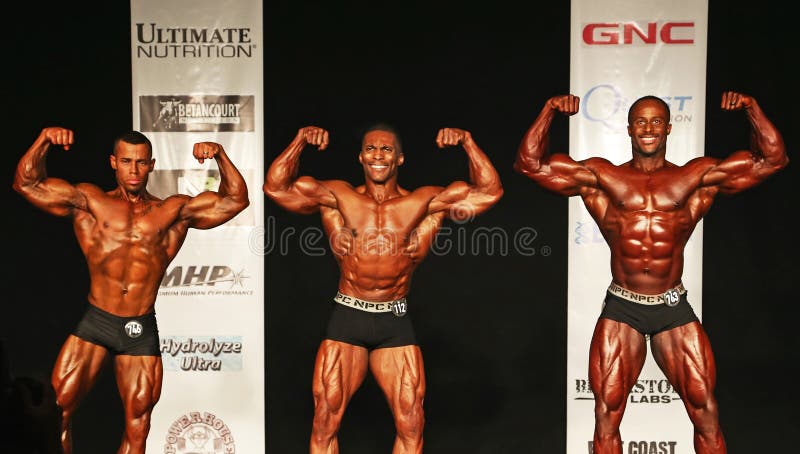 Bodybuilding Champs Pose Down Editorial Photo - Image of hardbodies ...