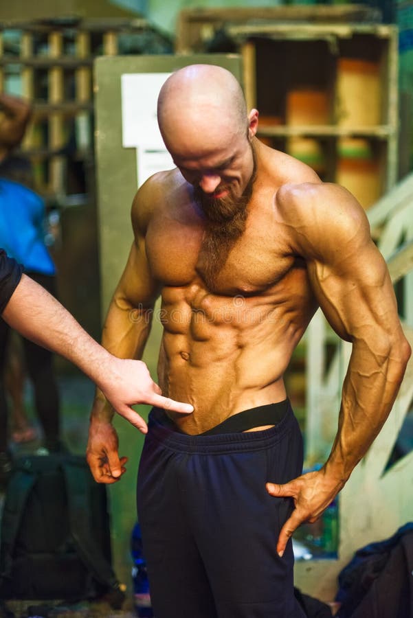 Bodybuilding Contest Behind the Scenes: the Contestant is Preparing for ...