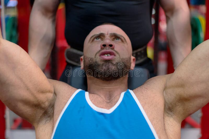 Bodybuilding Motivation. Two Bodybuilders Train Together at the Gym ...