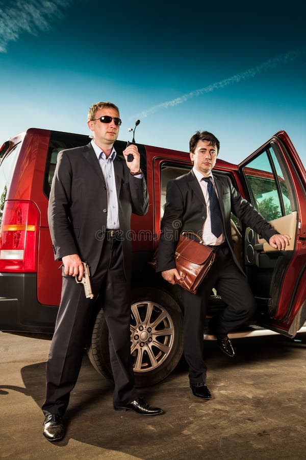 Bodyguard and its boss stock image. Image of safety, adult - 24119035