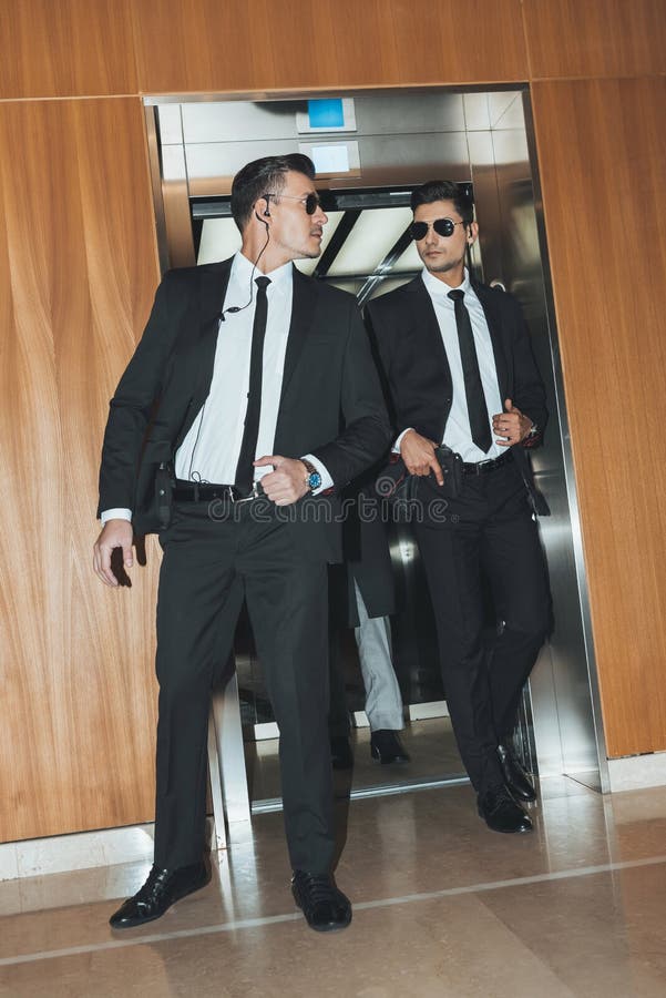 Bodyguards Going with Businessman and Reviewing Territory Stock Photo ...