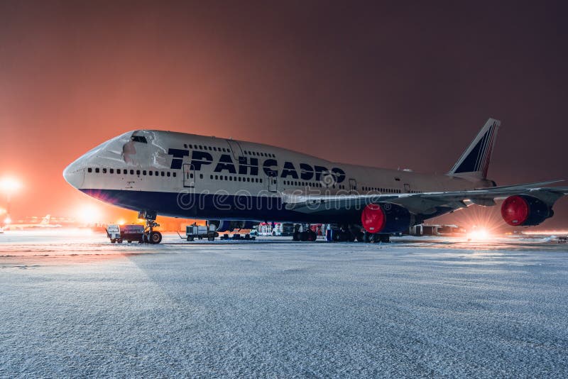 Boeing 747-400 Transaero Parked at the Airport at Night Editorial ...