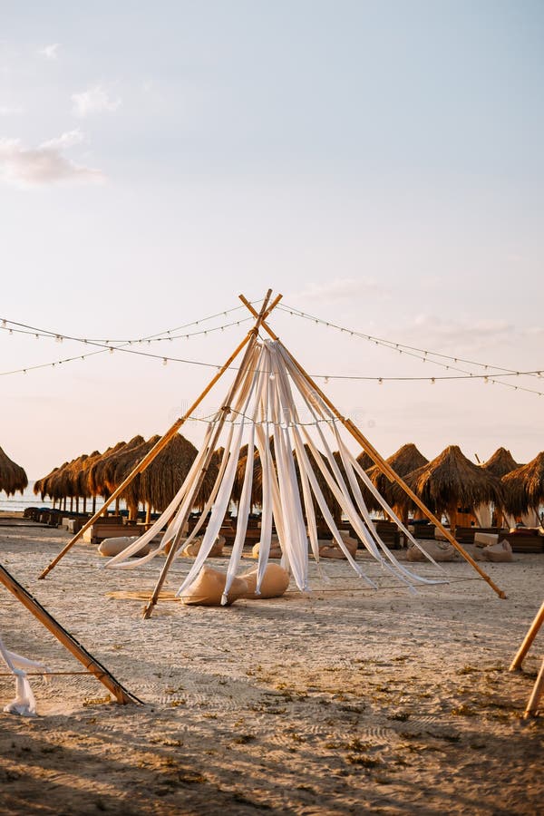 Boho Tent and Pillows on the Beach, in the Sunset Light. Stock Photo ...