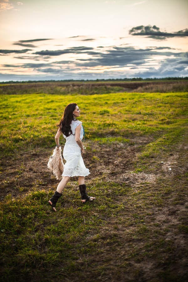 Boho woman in field stock image. Image of freedom, evening - 62595265