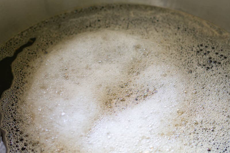 Boil Malt Grain in a Pot in a Home Brewing Process. Fermentation of ...