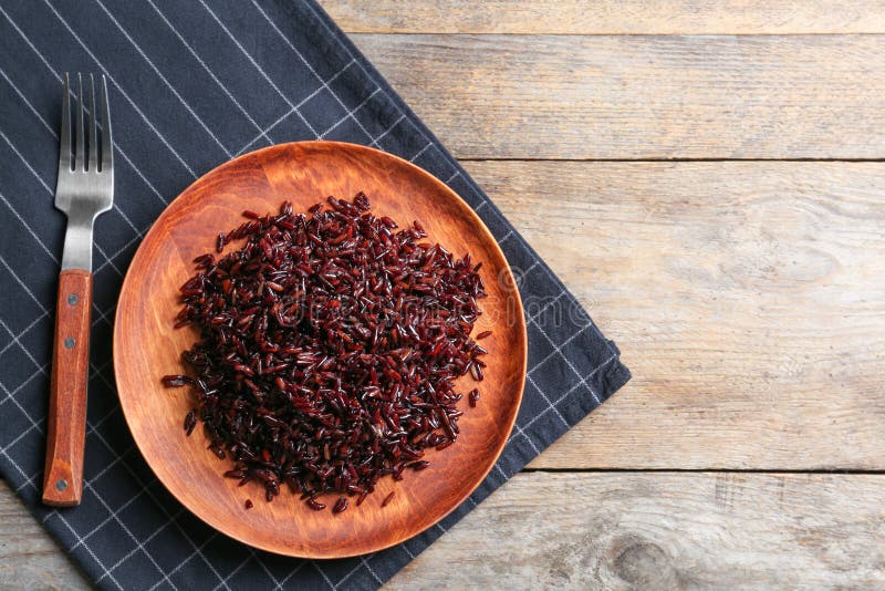 Boiled Brown Rice Served on Wooden Table, Top View. Stock Photo - Image ...