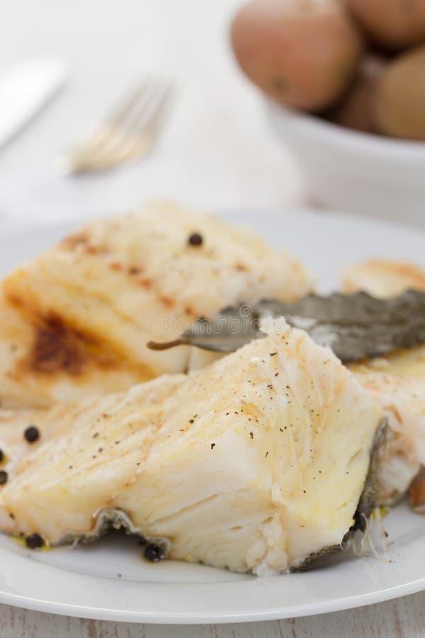 Boiled Cod Fish with Black Pepper on White Plate Stock Photo - Image of ...