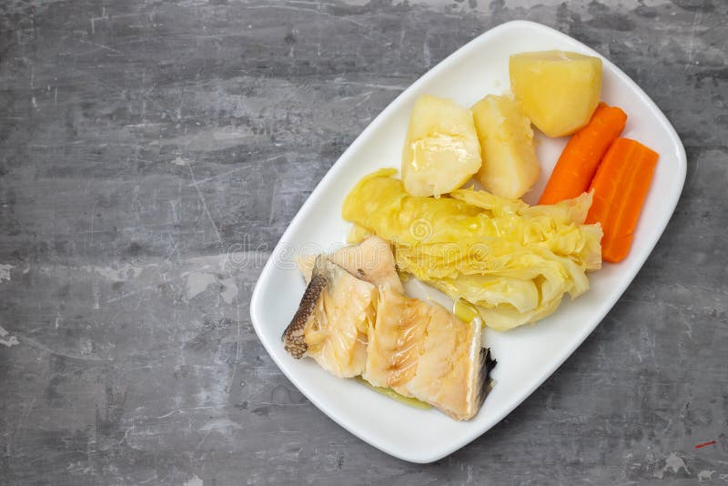 Cod Fish with Boiled Vegetables and Egg on White Dish Stock Photo ...